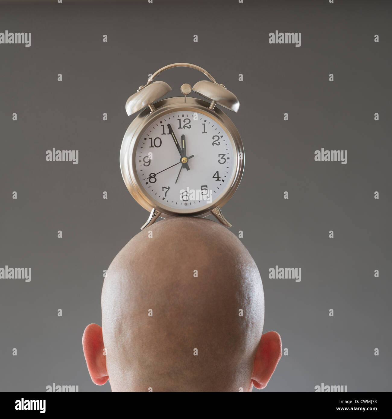 Back view man alarm clock hi-res stock photography and images - Alamy