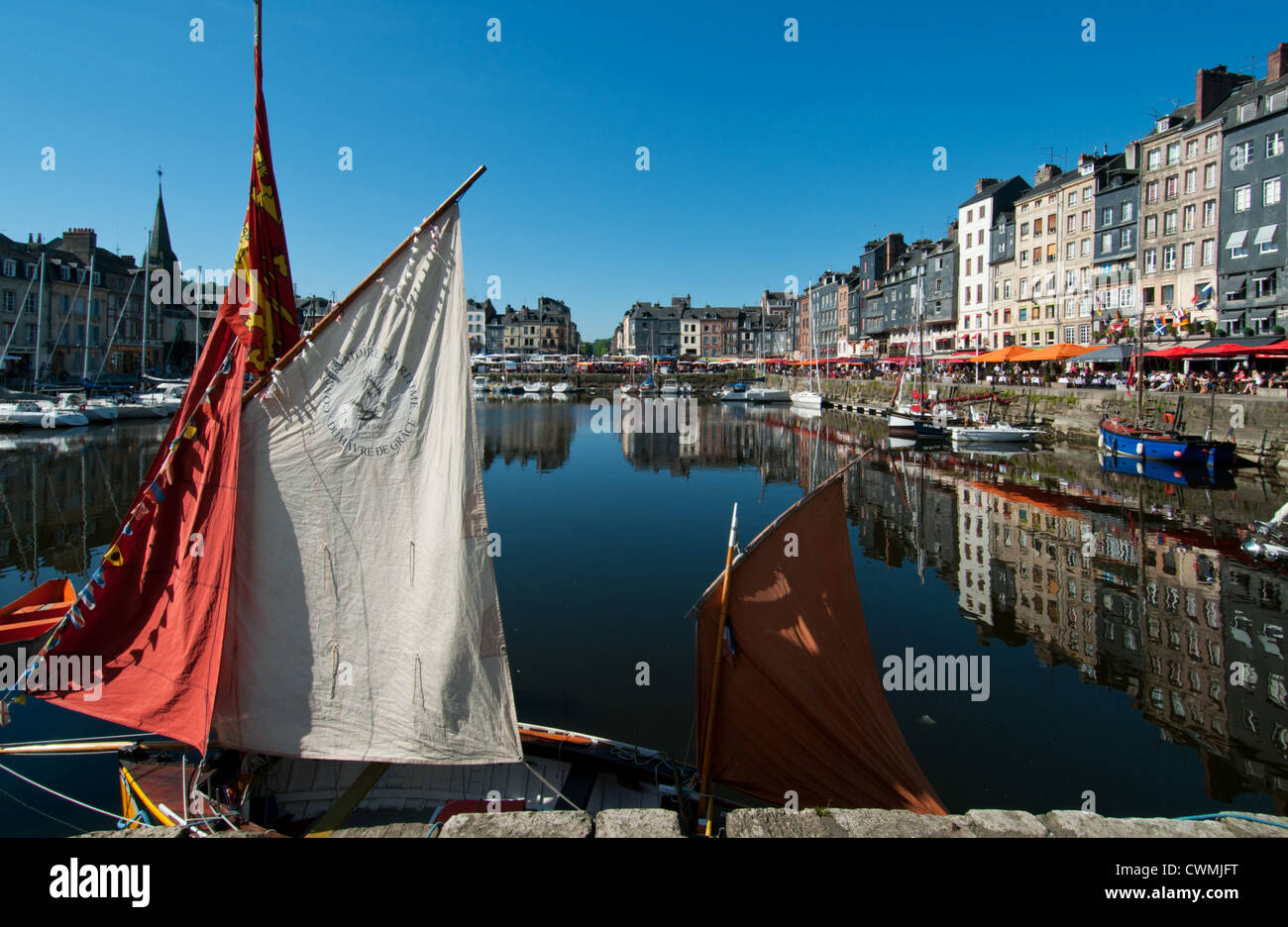 The Old Dock of Honfleur surrounded by picturesque narrow houses, Basse ...