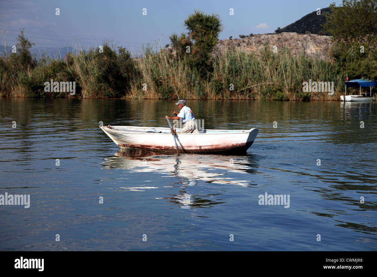Man rowing traditional boat hi-res stock photography and images - Alamy