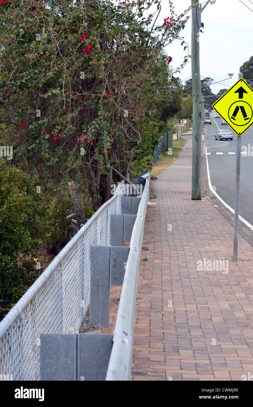 brick footpath with zebra crossing up ahead Stock Photo - Alamy