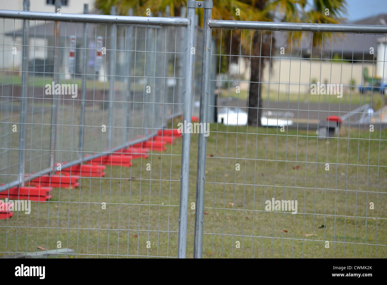 Fenced off canal block of land Stock Photo - Alamy