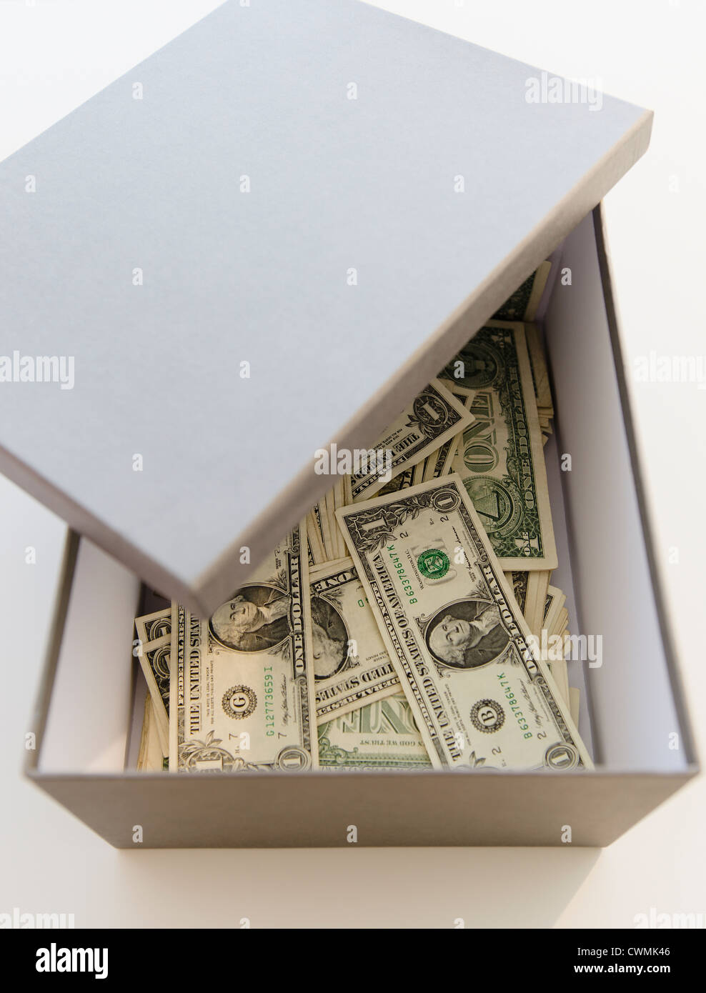 Box full of dollar banknotes Stock Photo - Alamy