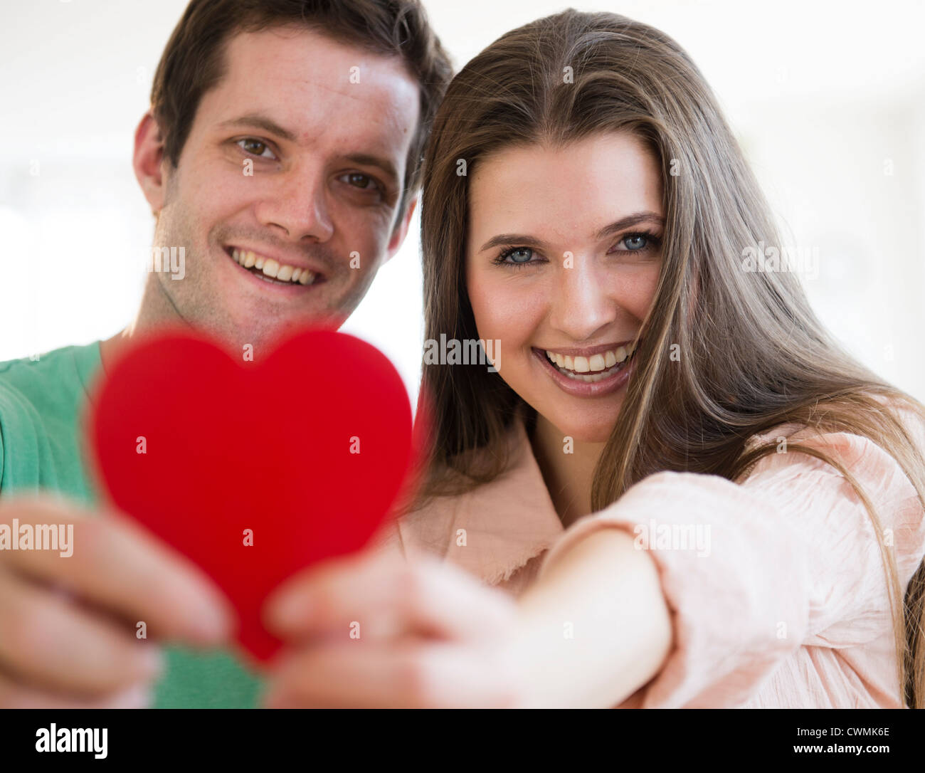 Couple red heart home hi-res stock photography and images - Alamy