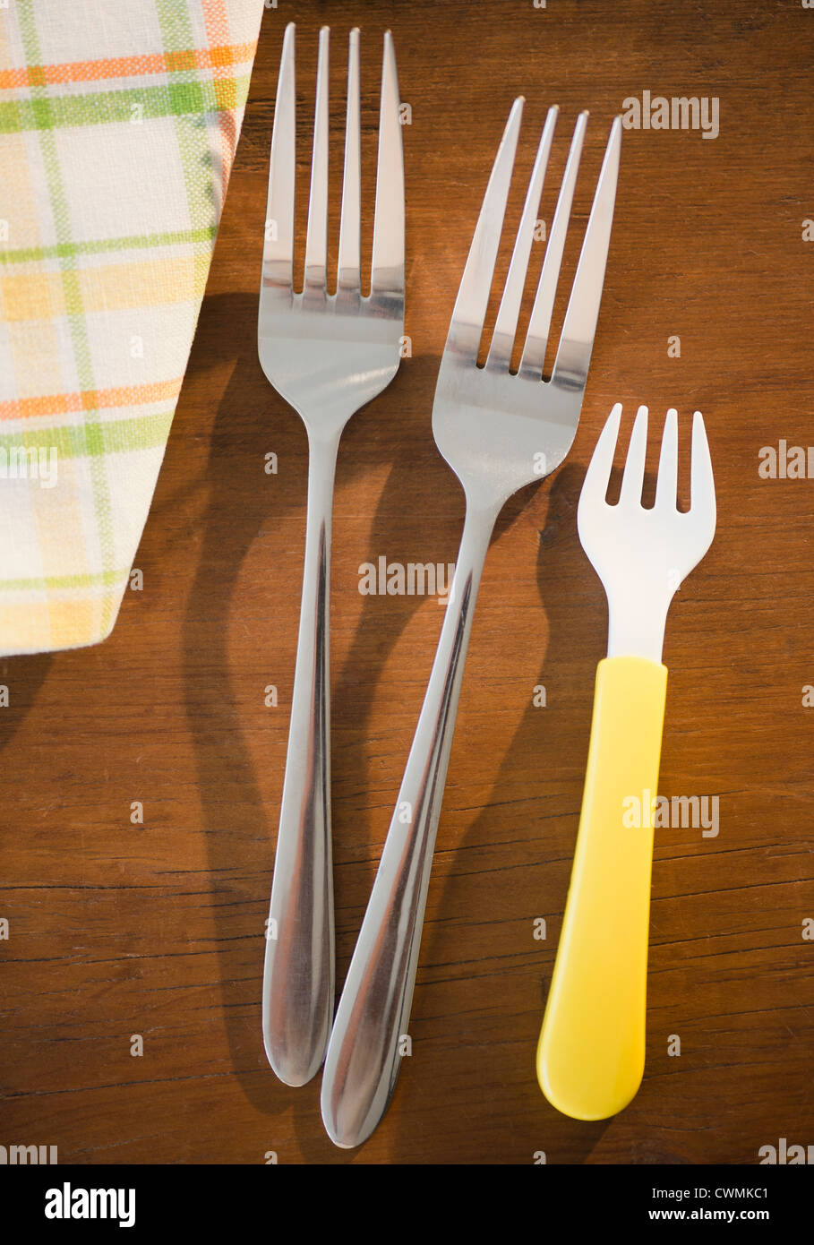 Forks on table Stock Photo - Alamy