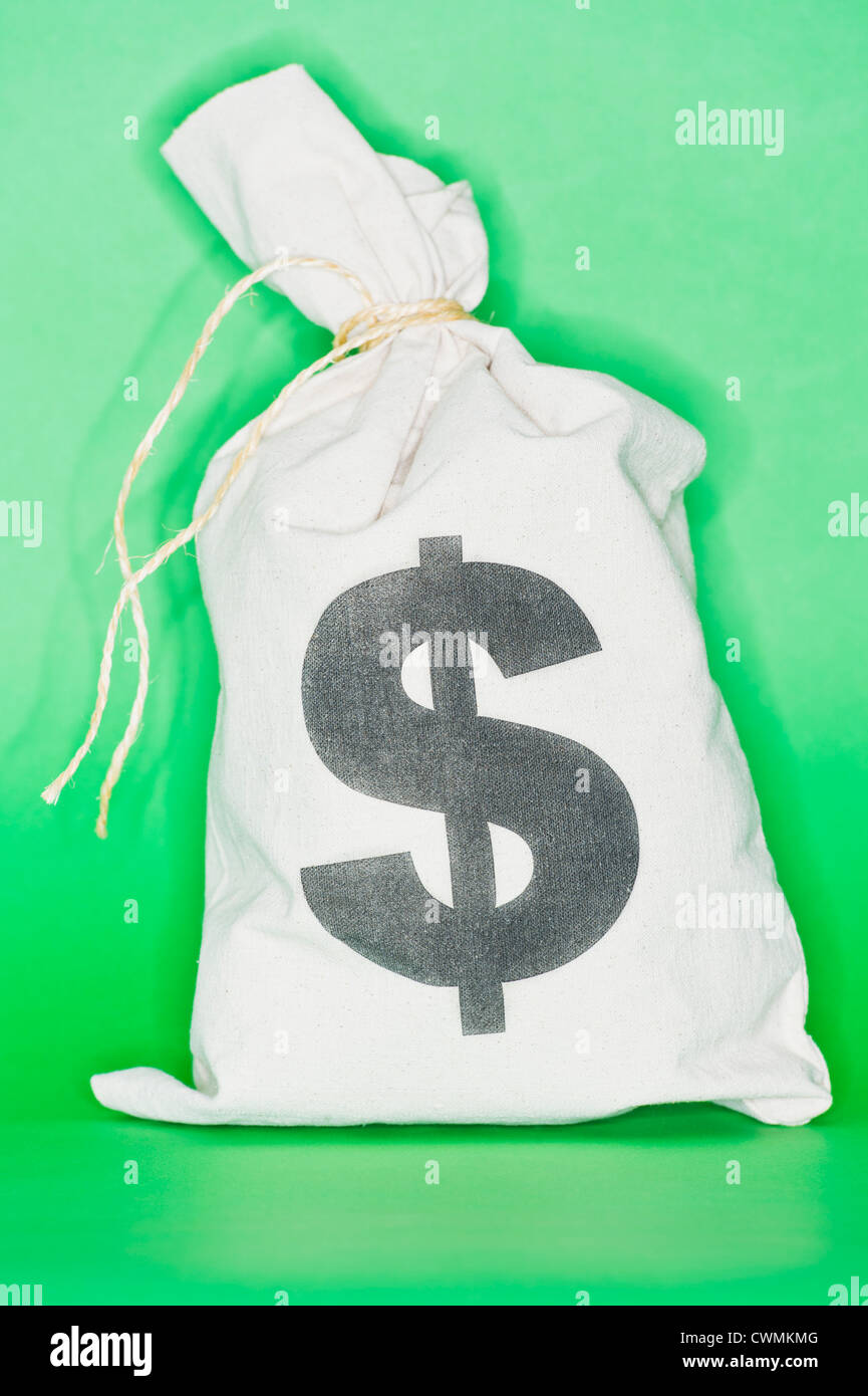 Studio shot of money bag Stock Photo - Alamy