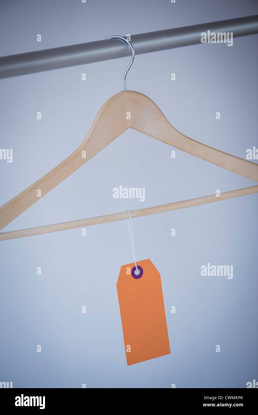 Studio shot of hanger with price tag Stock Photo - Alamy