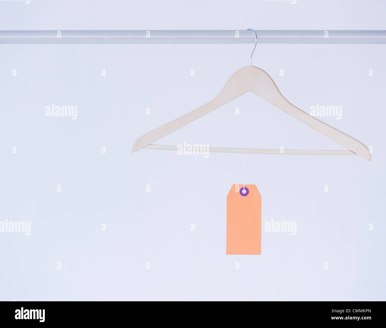 Studio shot of hanger with price tag Stock Photo - Alamy