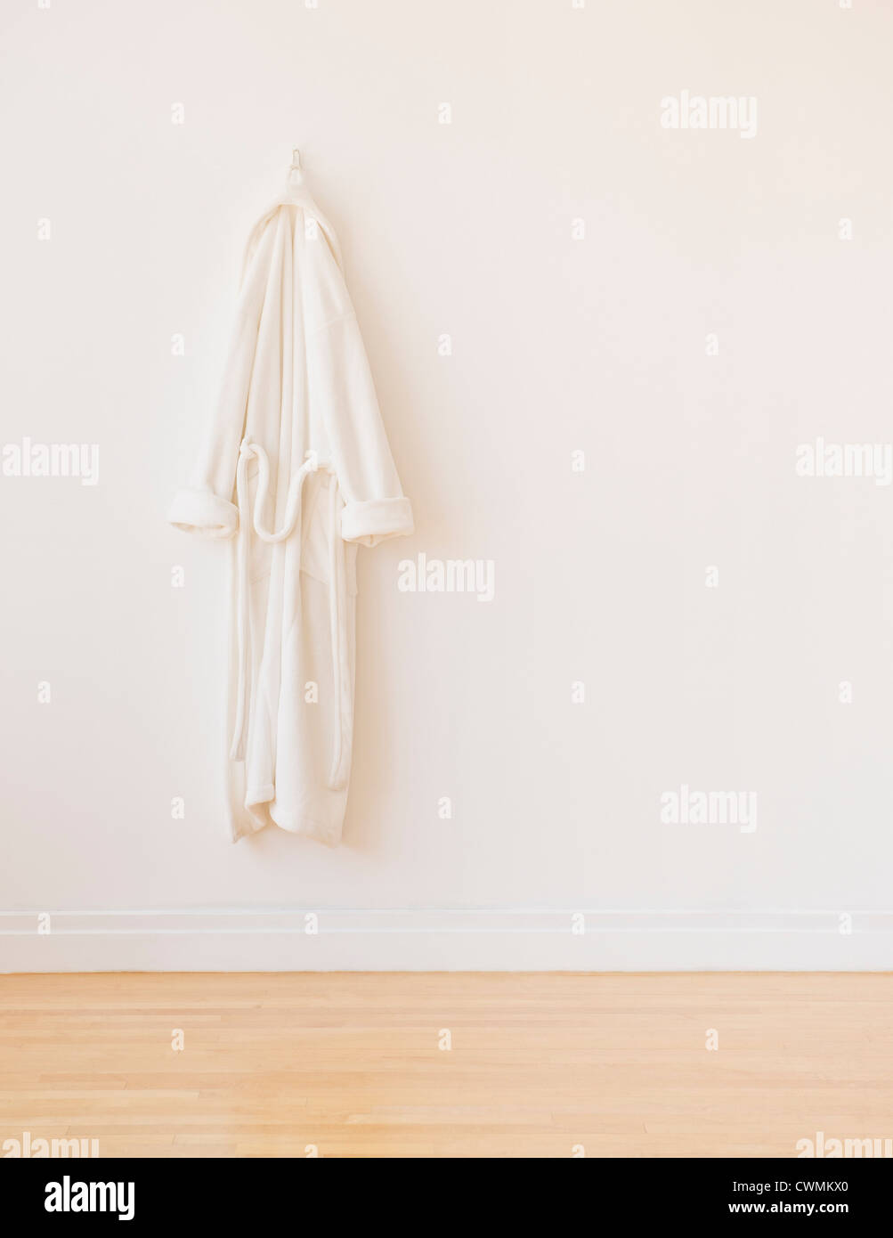 Studio shot of white bathrobe Stock Photo - Alamy