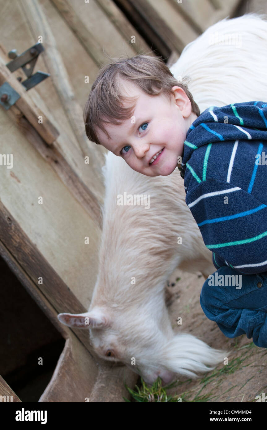 Boy with goat hi-res stock photography and images - Alamy