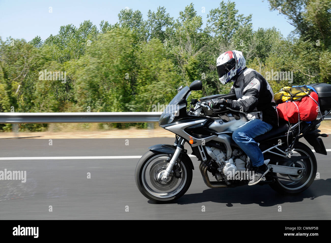 high road Yamaha motor bike rider Stock Photo - Alamy