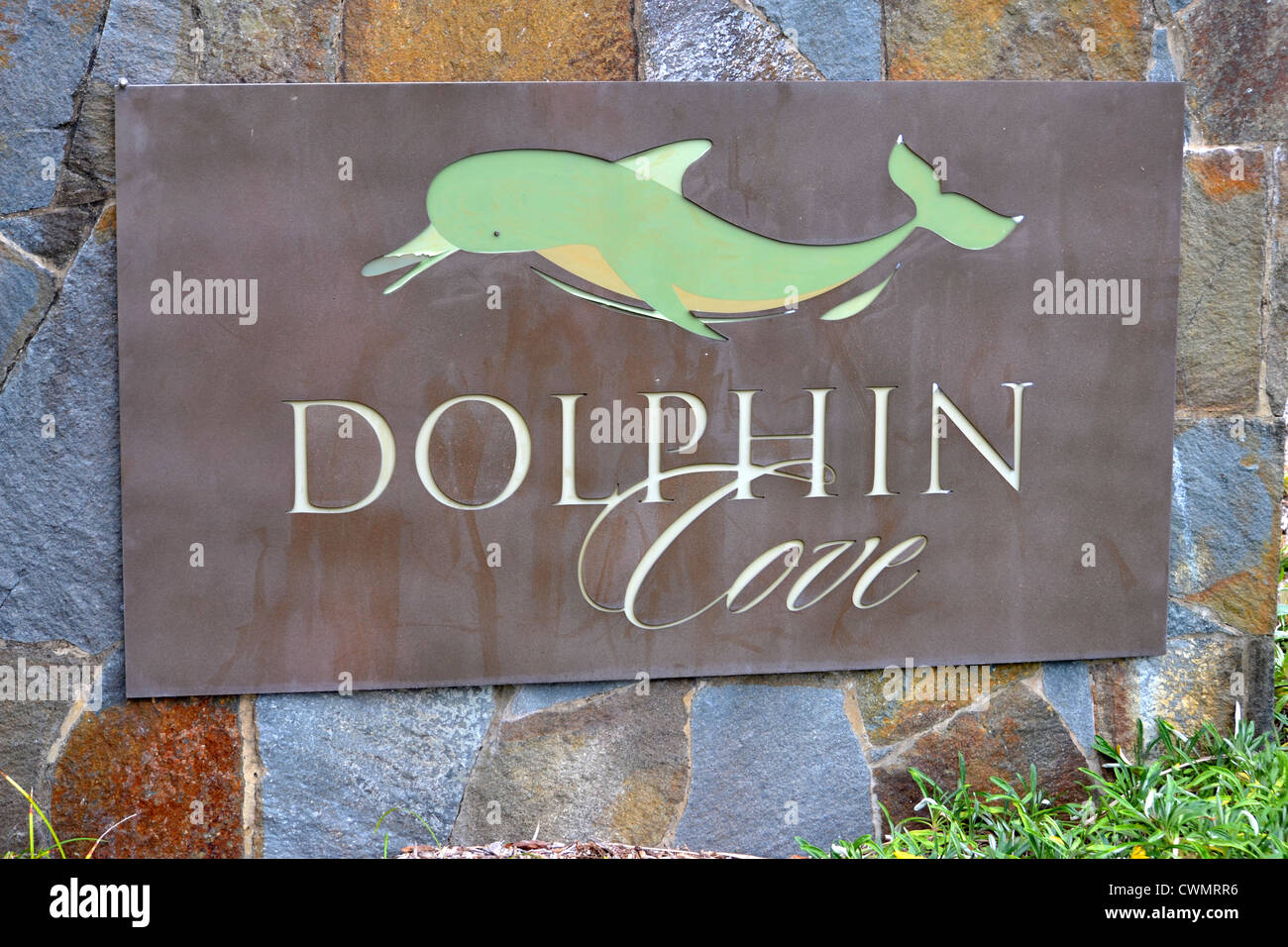 Dolphin Cove entry sign Stock Photo - Alamy