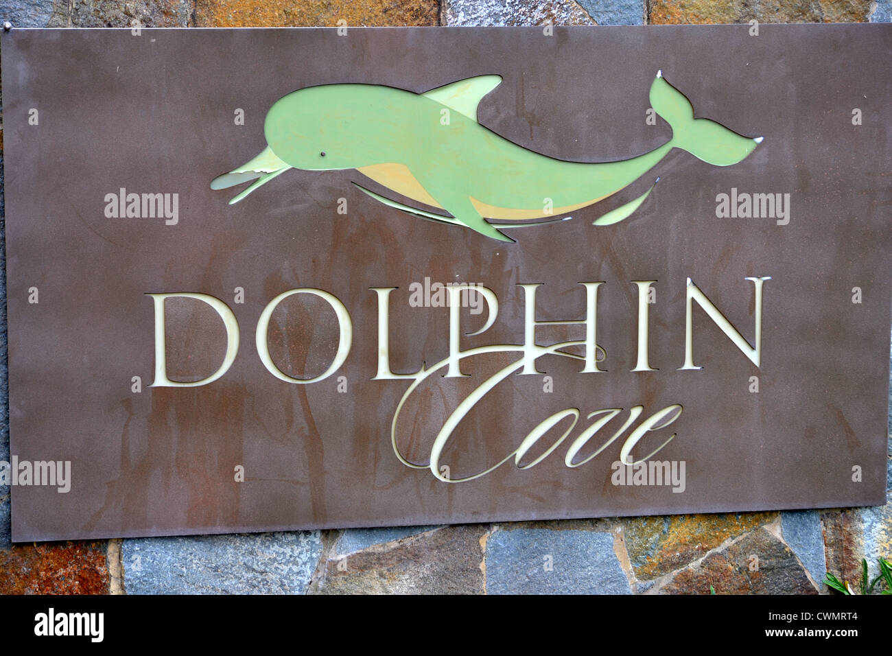 Dolphin Cove entry sign Stock Photo - Alamy