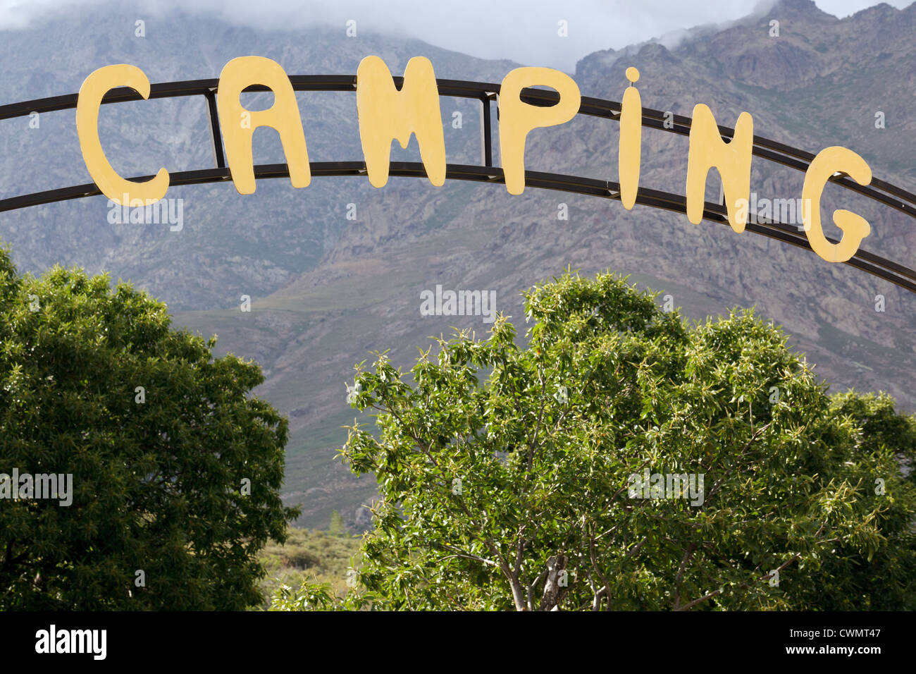 large camping entrance sign on mountain landscape Stock Photo - Alamy