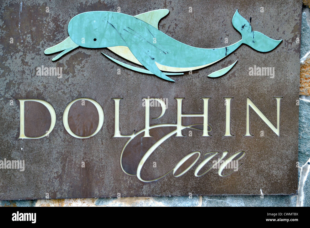 Dolphin Cove entry sign Stock Photo - Alamy