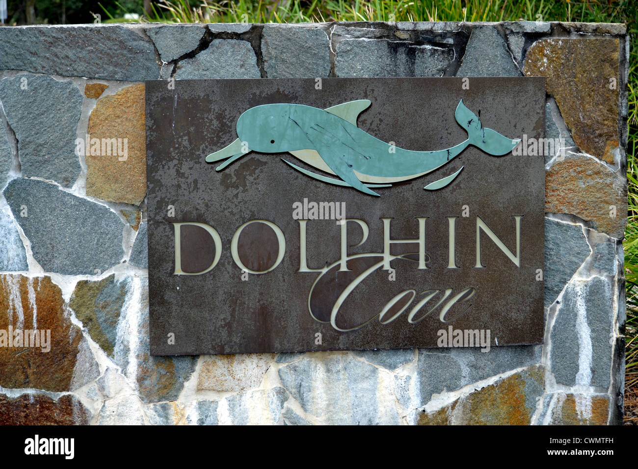 Dolphin Cove entry sign Stock Photo - Alamy