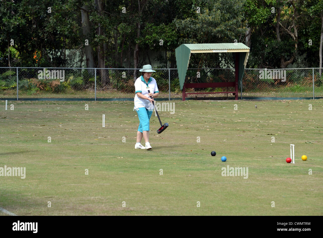 woman playing croquet Stock Photo - Alamy