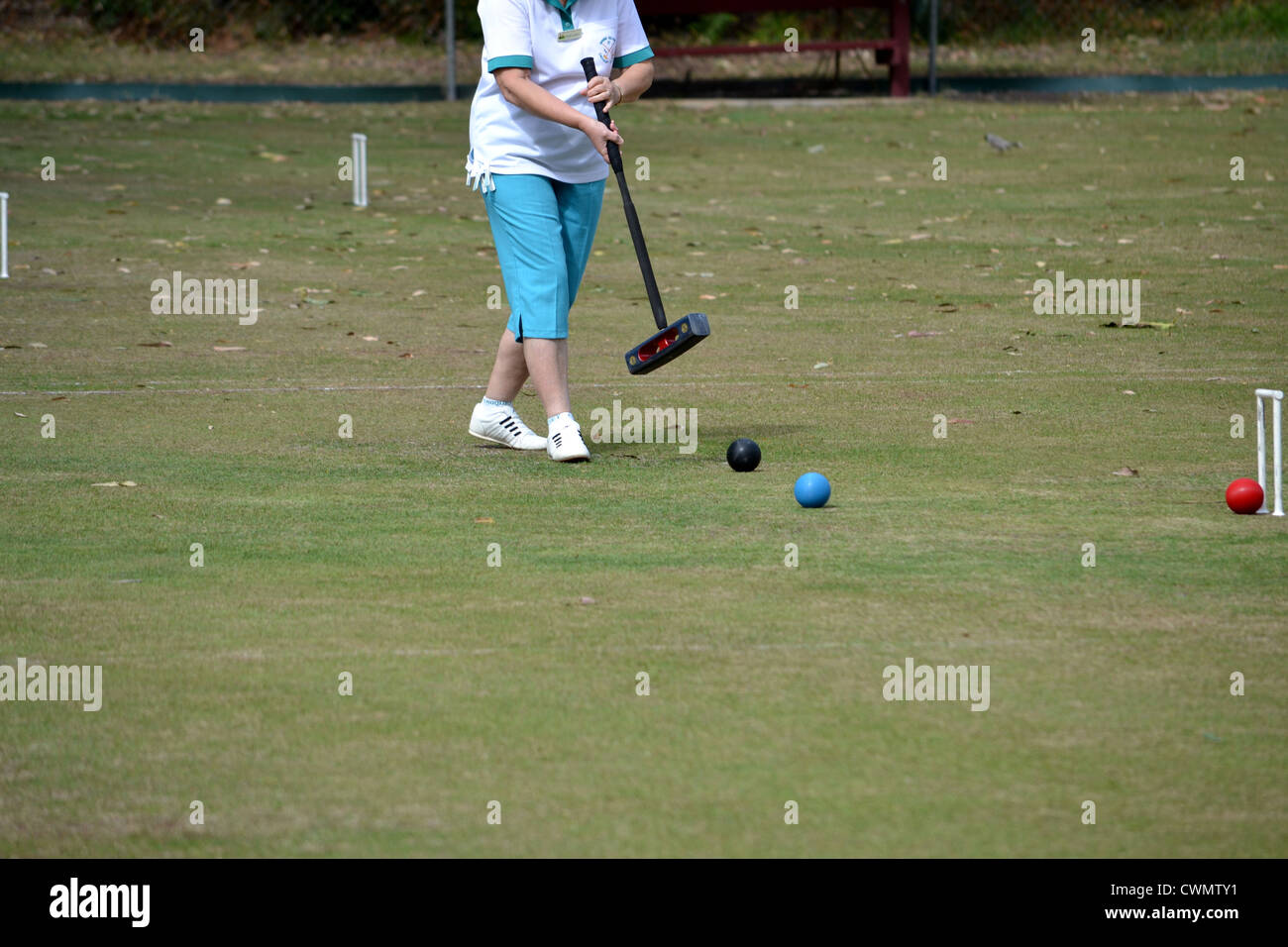 woman playing croquet Stock Photo - Alamy