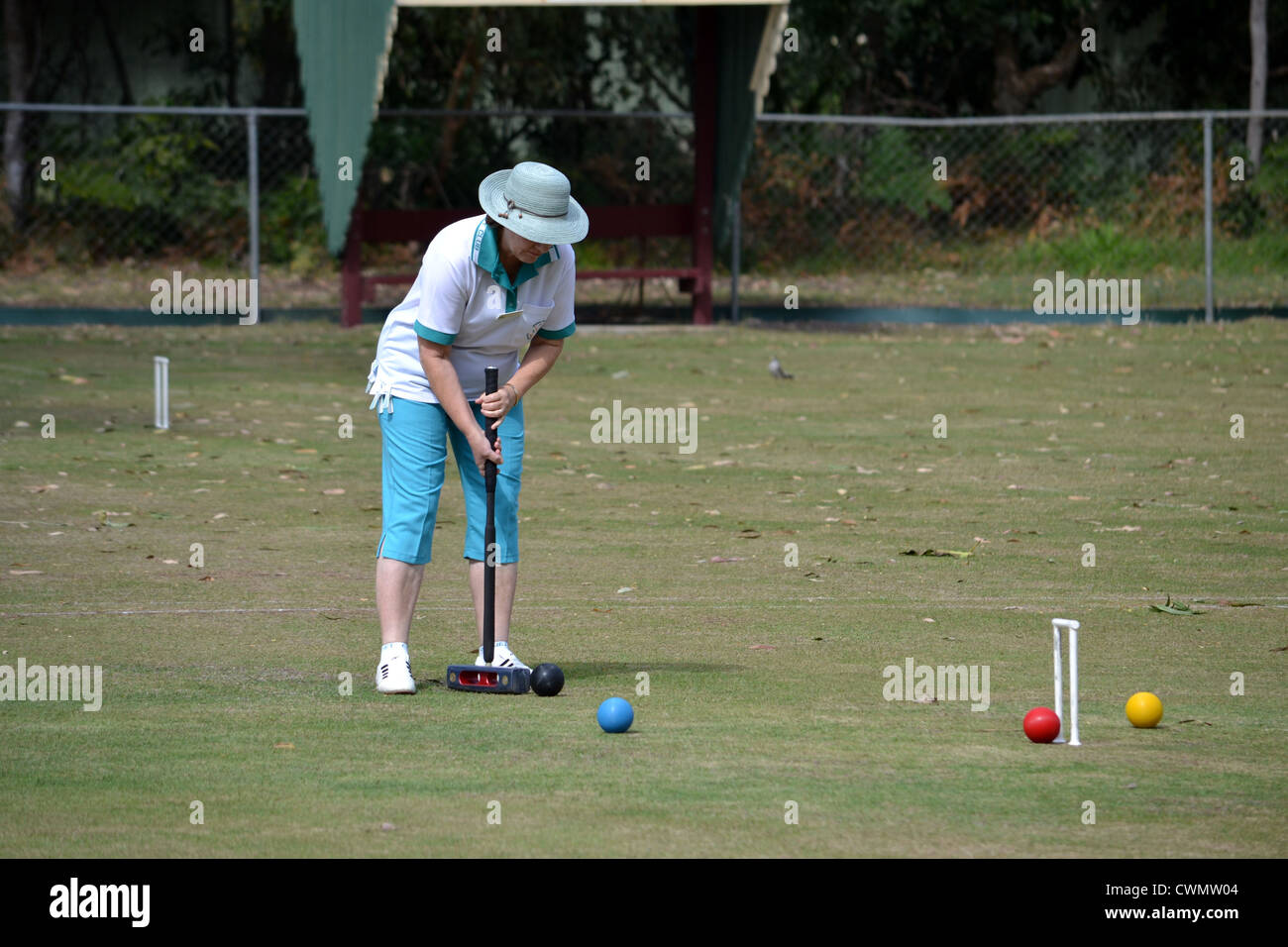 woman playing croquet Stock Photo - Alamy