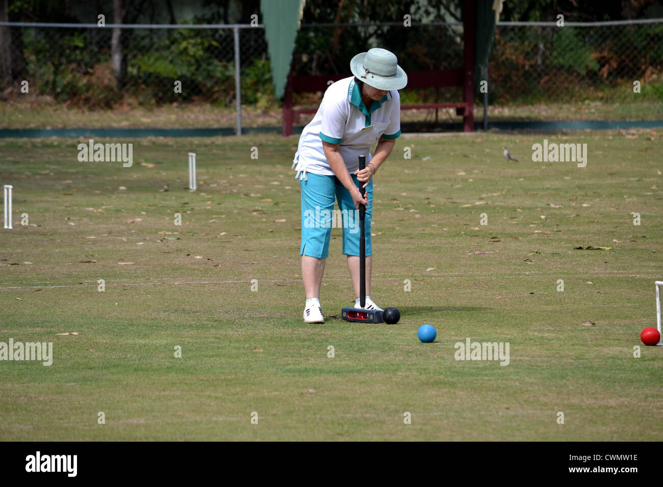 woman playing croquet Stock Photo - Alamy