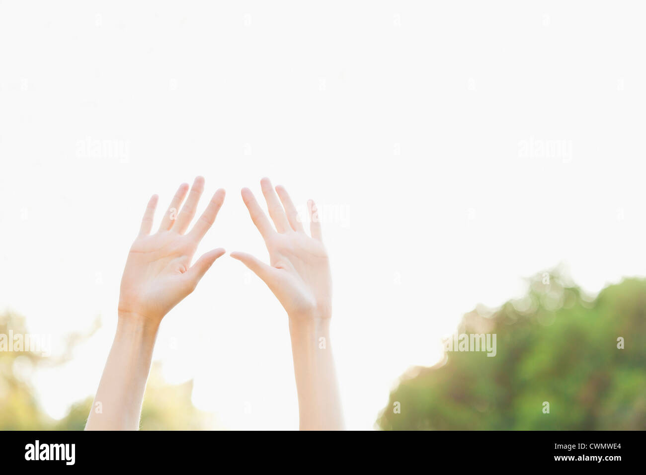 USA, California, Los Angeles, Female hands raised up Stock Photo - Alamy
