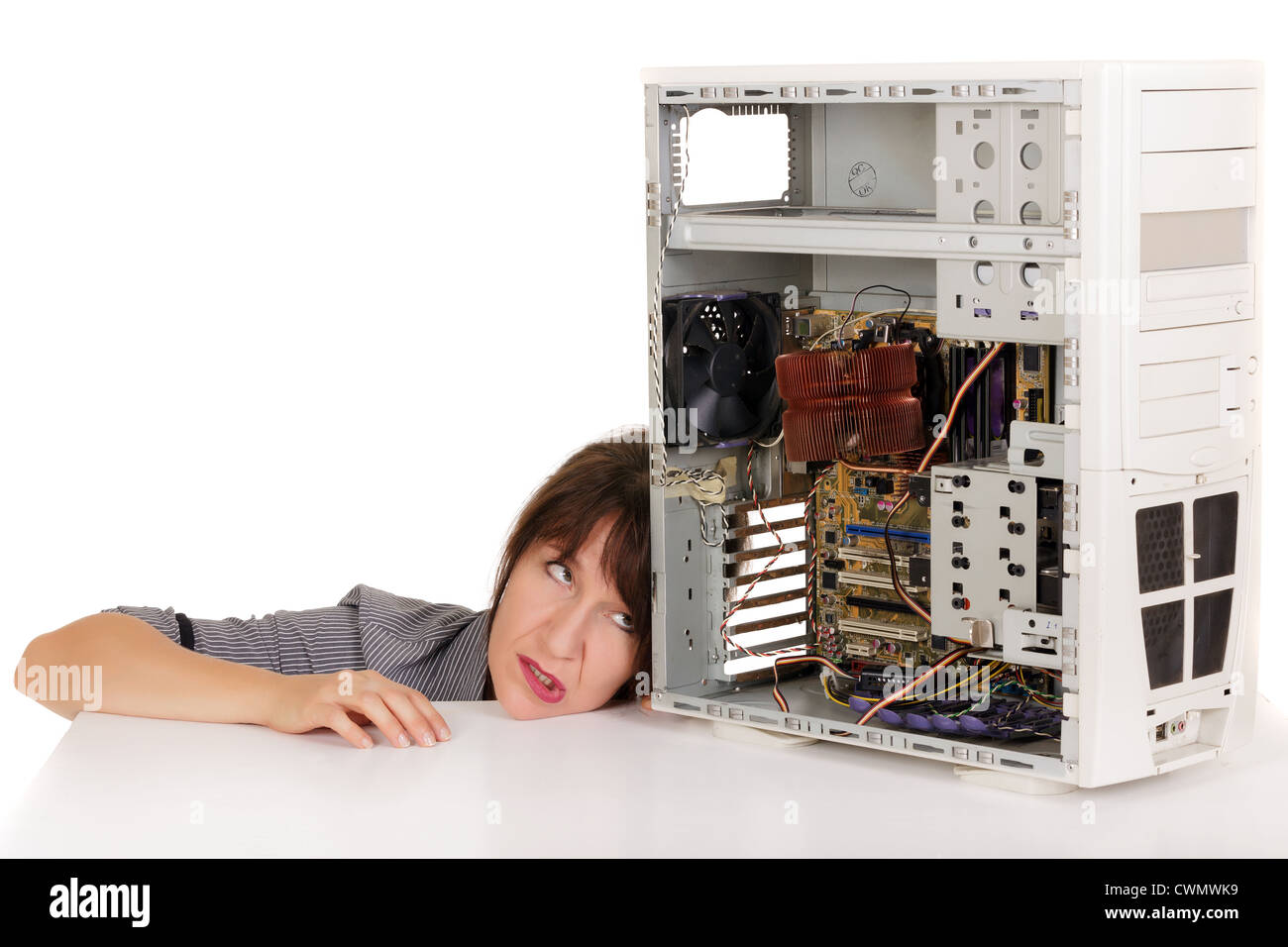 business woman grimacing with broken computer Stock Photo - Alamy