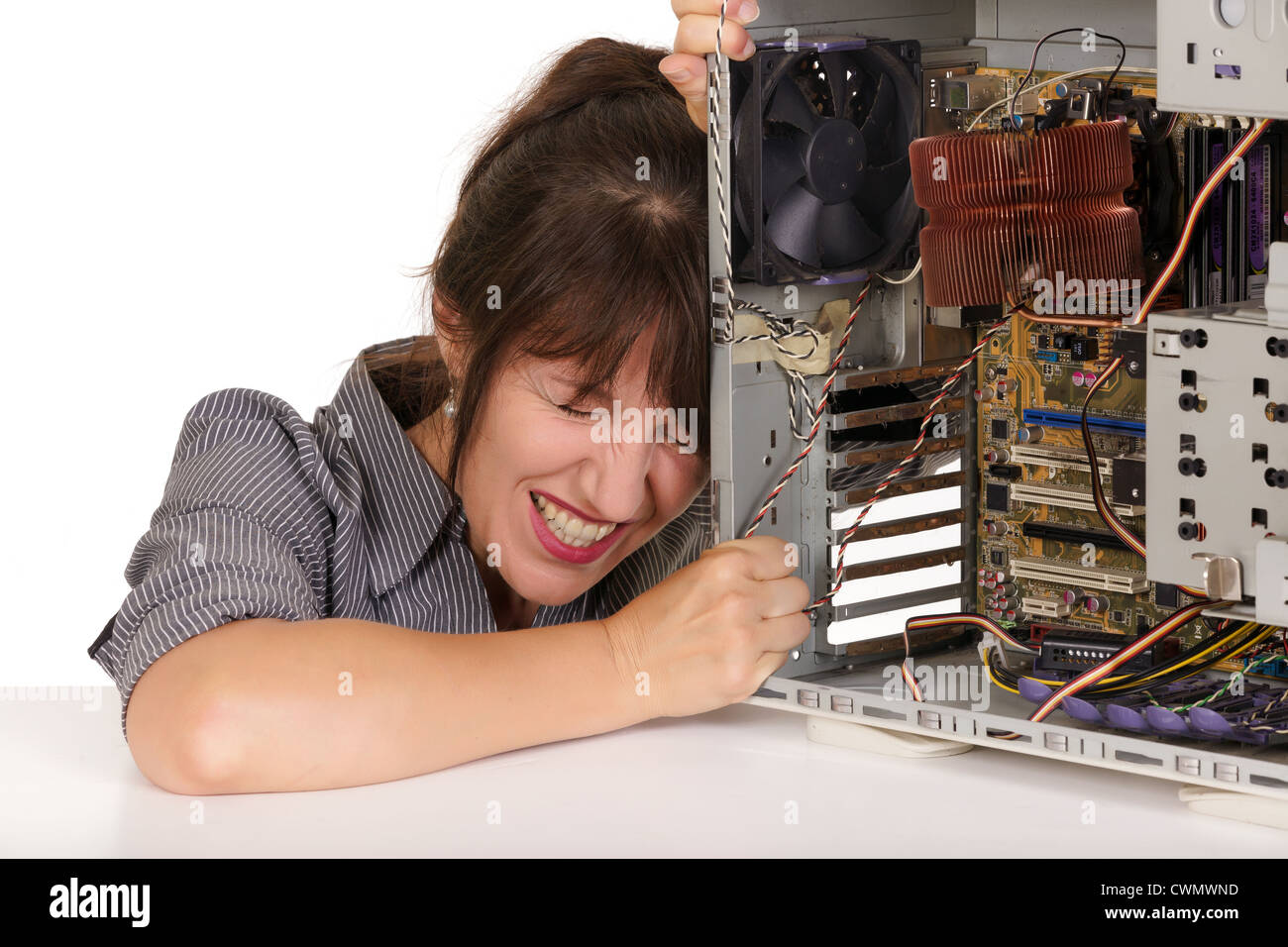 displeased woman with broken computer Stock Photo - Alamy