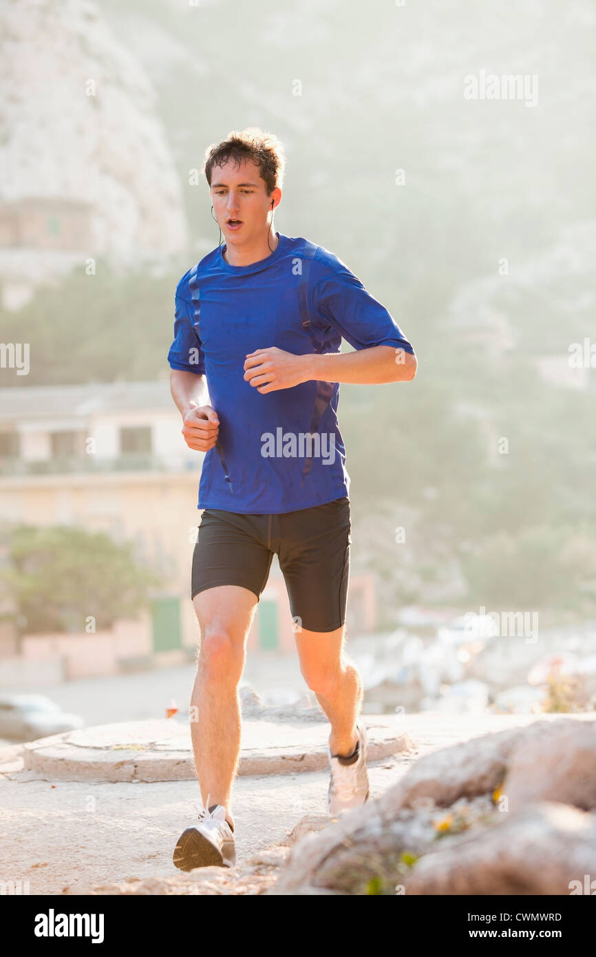 France, Marseille, Man jogging on sunny day Stock Photo - Alamy