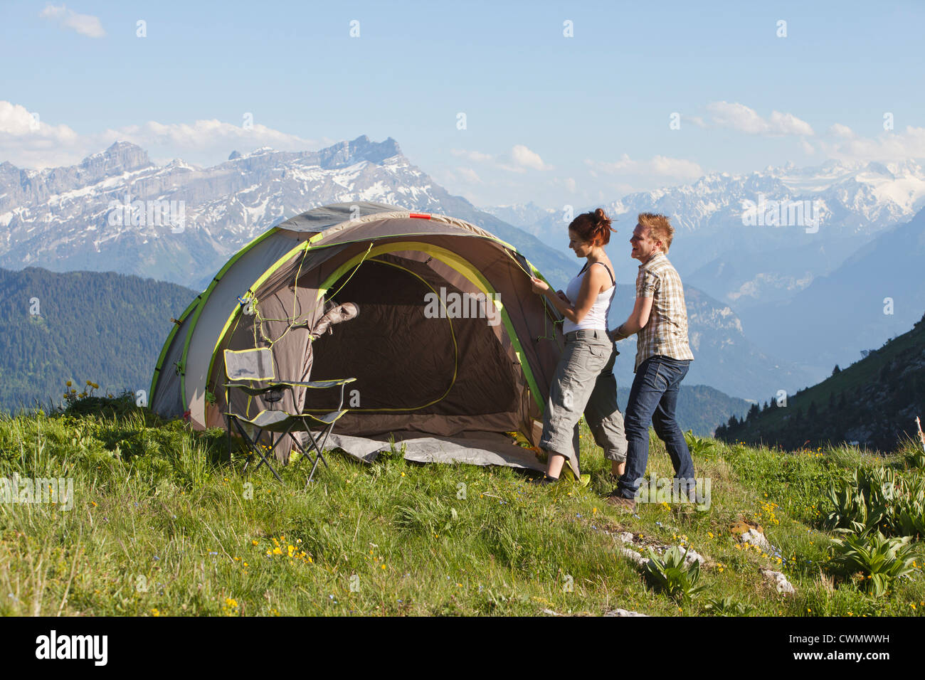 Couple pitching tent camping hi-res stock photography and images - Alamy