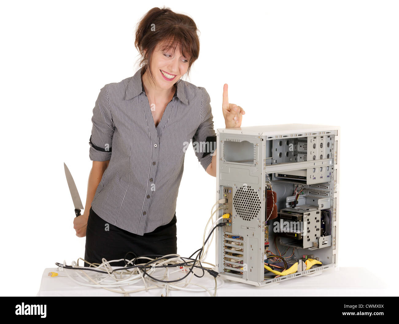 business woman warn her computer before killing it ! Stock Photo - Alamy
