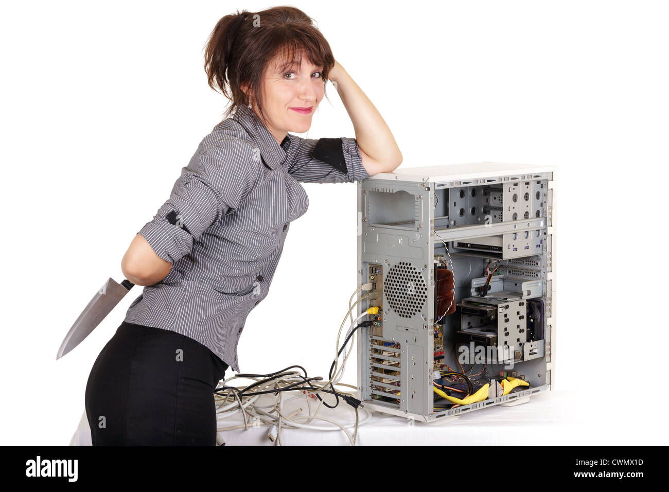 Woman hiding knife hi-res stock photography and images - Alamy