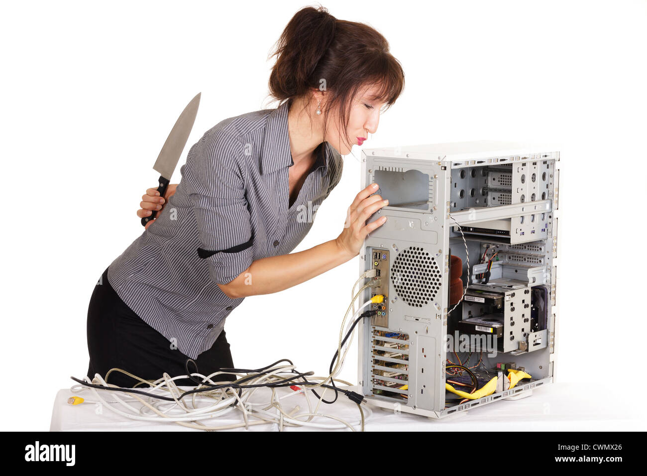 Woman hiding knife hi-res stock photography and images - Alamy