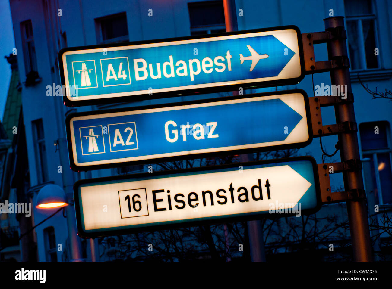 View of road signs at dusk Stock Photo - Alamy