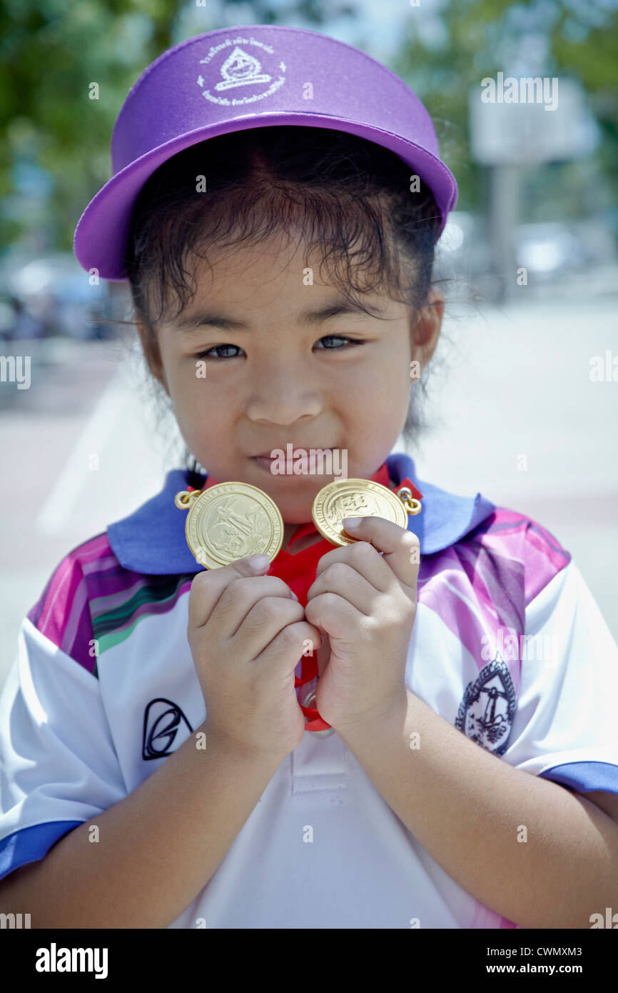 School Sports Day Thailand Schoolgirl Proudly Displays Her Two Gold Medals Won At The School