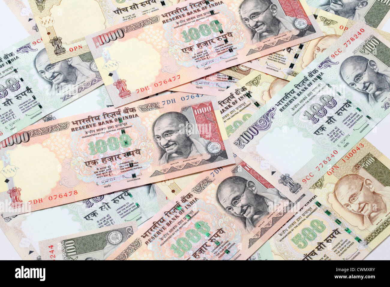 Indian rupee hundred, fivehundered and thousand notes Stock Photo - Alamy