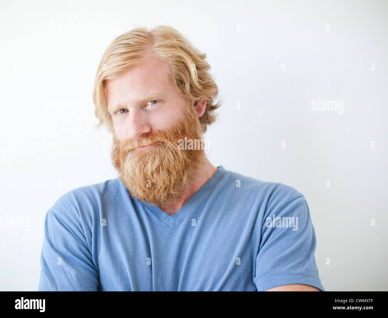 Studio portrait of man with beard Stock Photo - Alamy