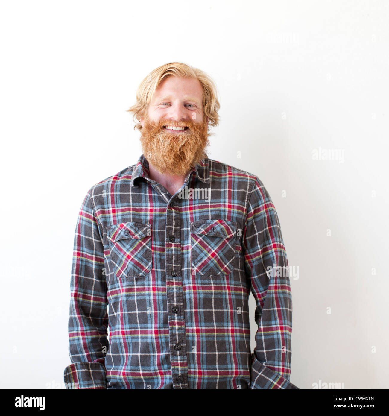 Studio portrait of man with beard Stock Photo - Alamy