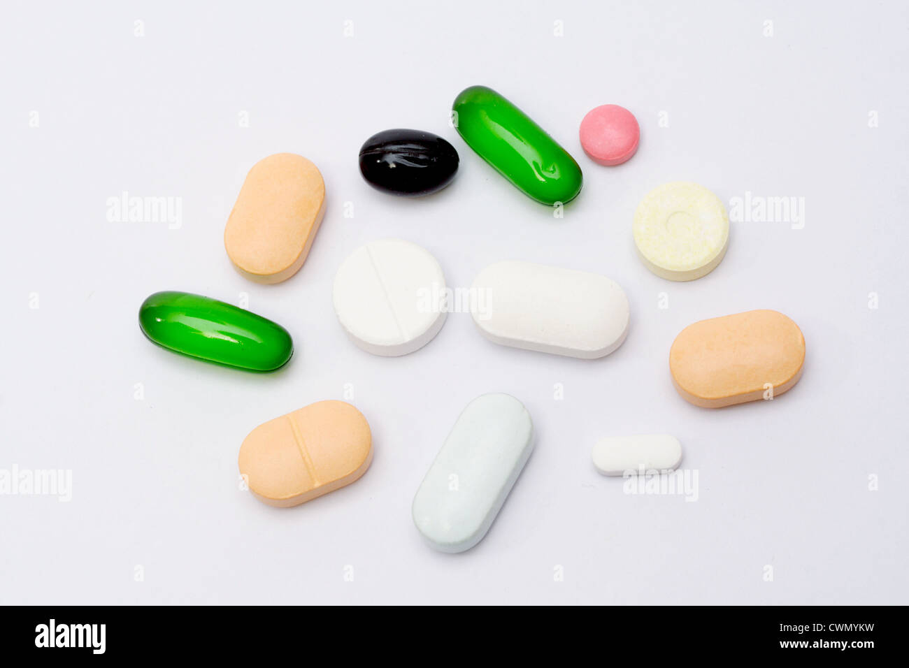 Assorted pills on white background Stock Photo - Alamy
