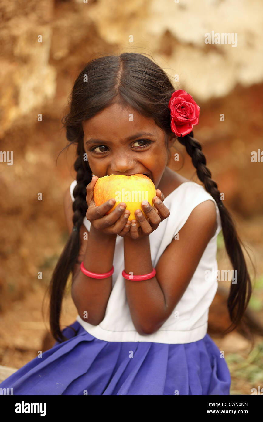 Indian Girl Eating Snack High Resolution Stock Photography and Images ...