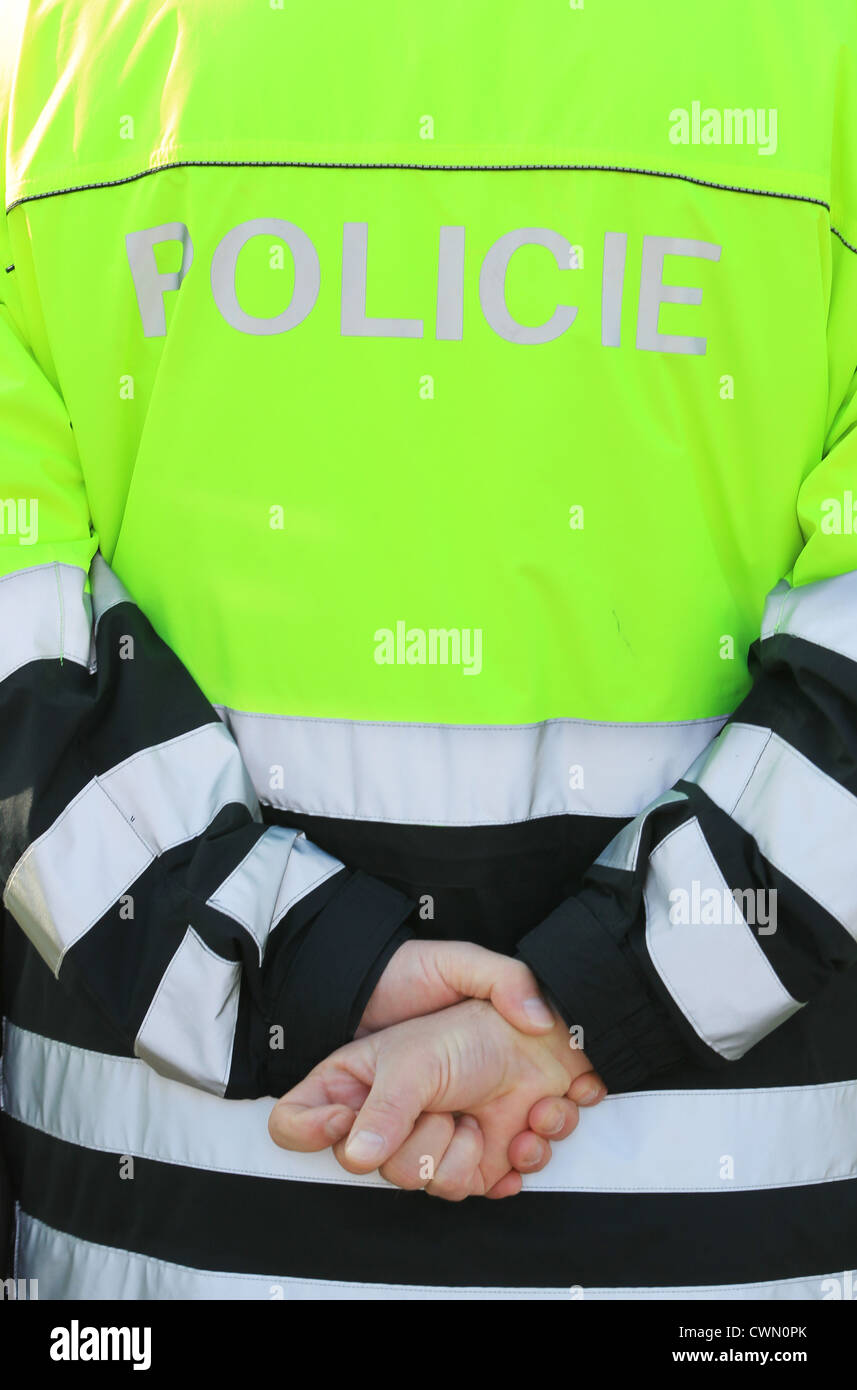 Policeman hands behind back hi-res stock photography and images - Alamy