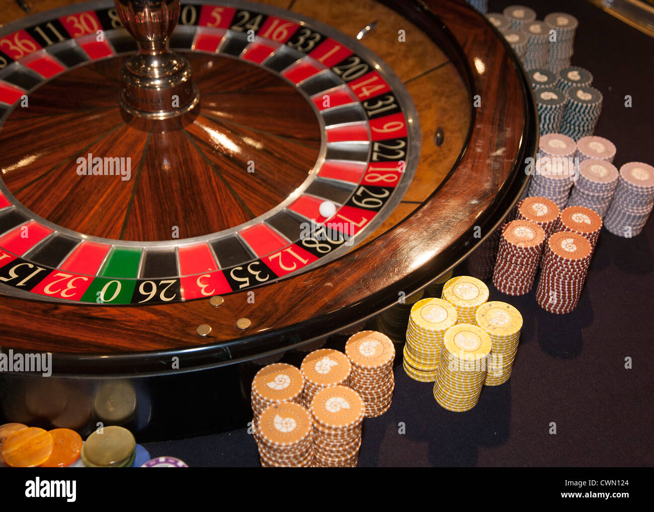 Gambling at roulette wheel Stock Photo - Alamy