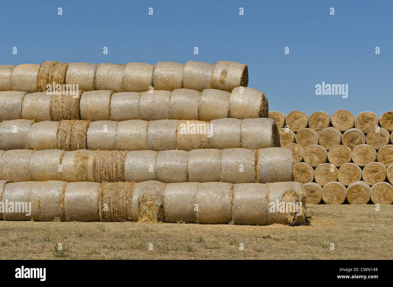 two big stacks of hay bales, horizontal shot Stock Photo - Alamy