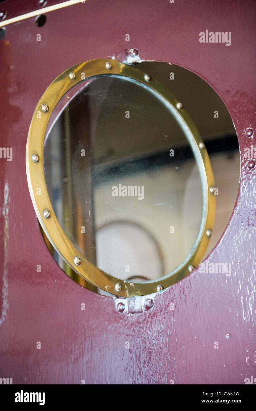 Train round window Stock Photo - Alamy