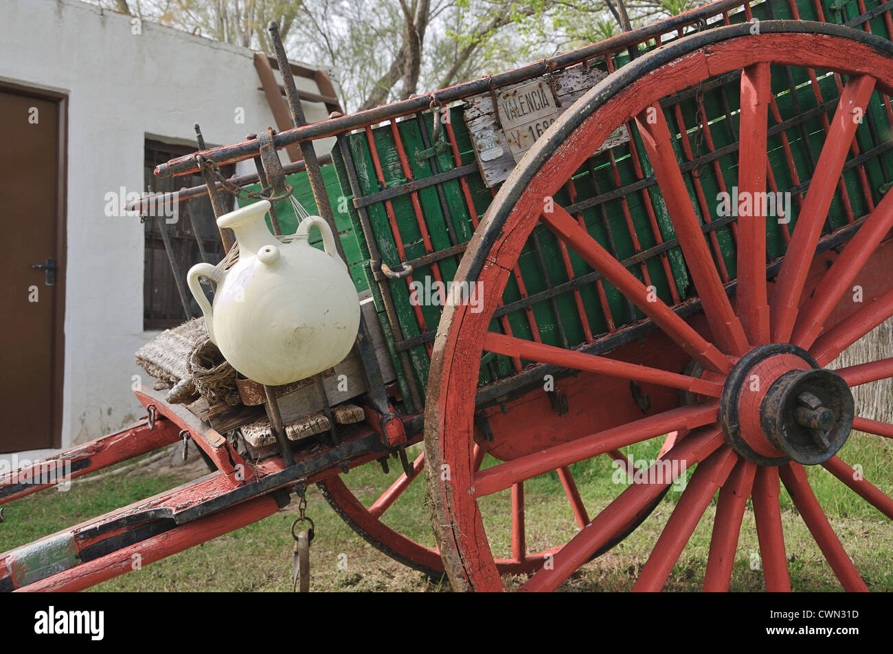 Old farm carriage in a Barraca (traditional valencian adobe house) yard ...