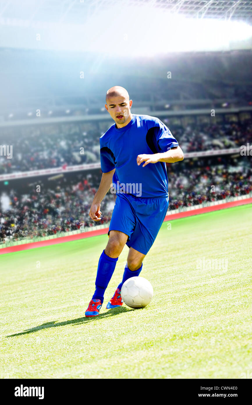 soccer or football player on the field Stock Photo - Alamy