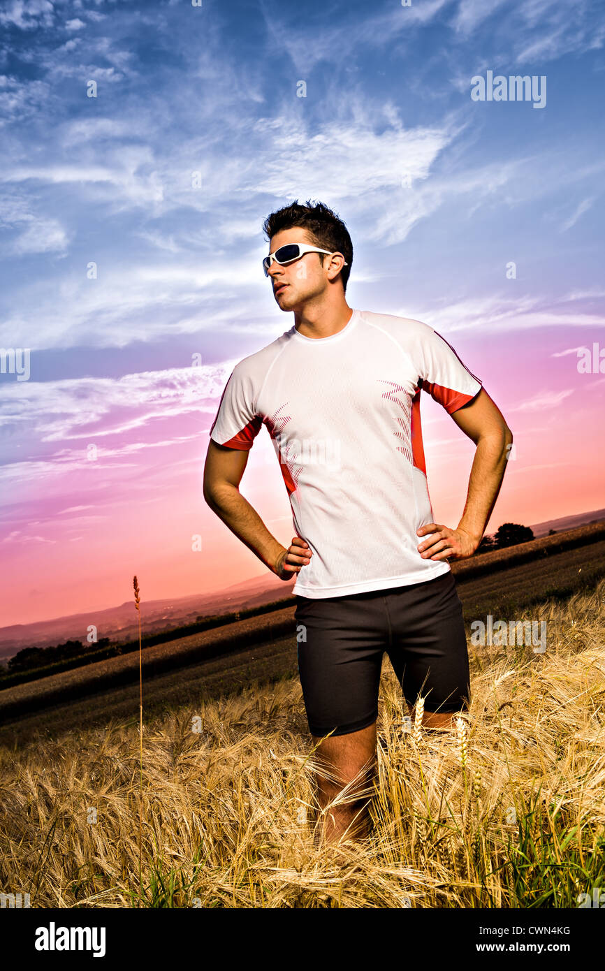 man jogging through the fields Stock Photo - Alamy