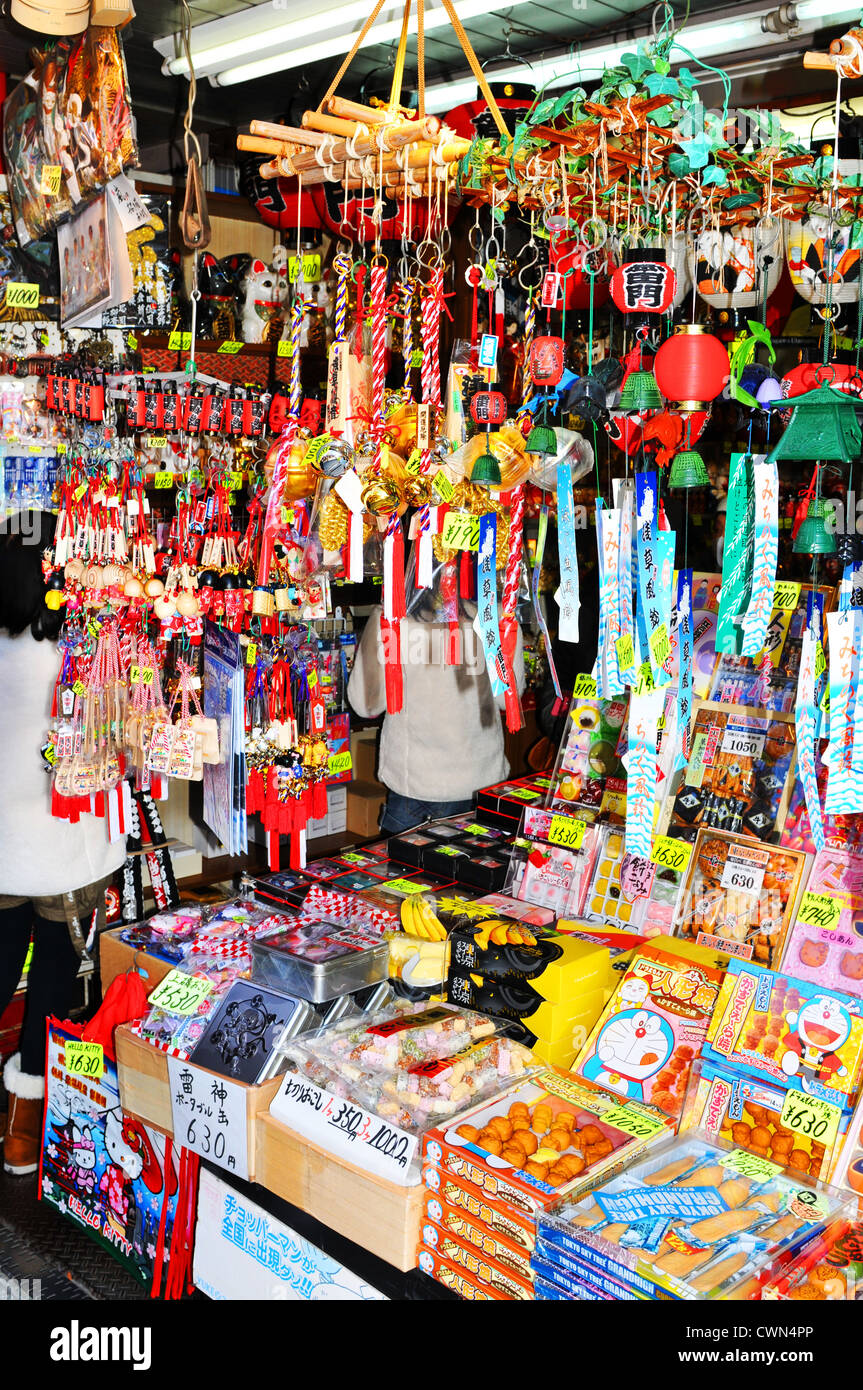 Tokyo, Japan - 31 December, 2011: Religious objects displayed in bazaar ...
