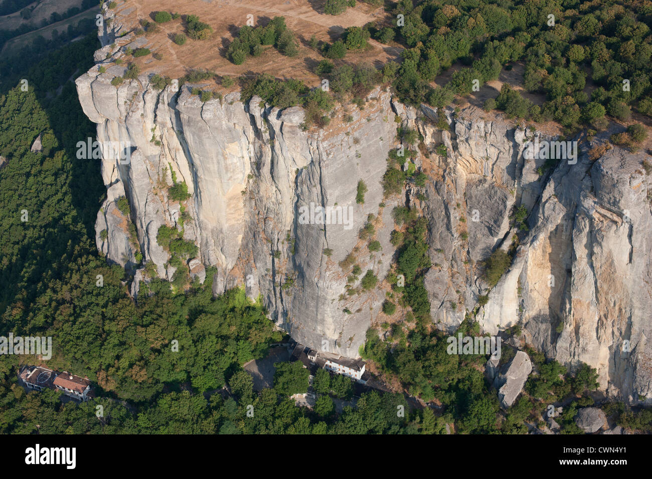AERIAL VIEW. Massive limestone cliff dwarfing the Hermitage of ...
