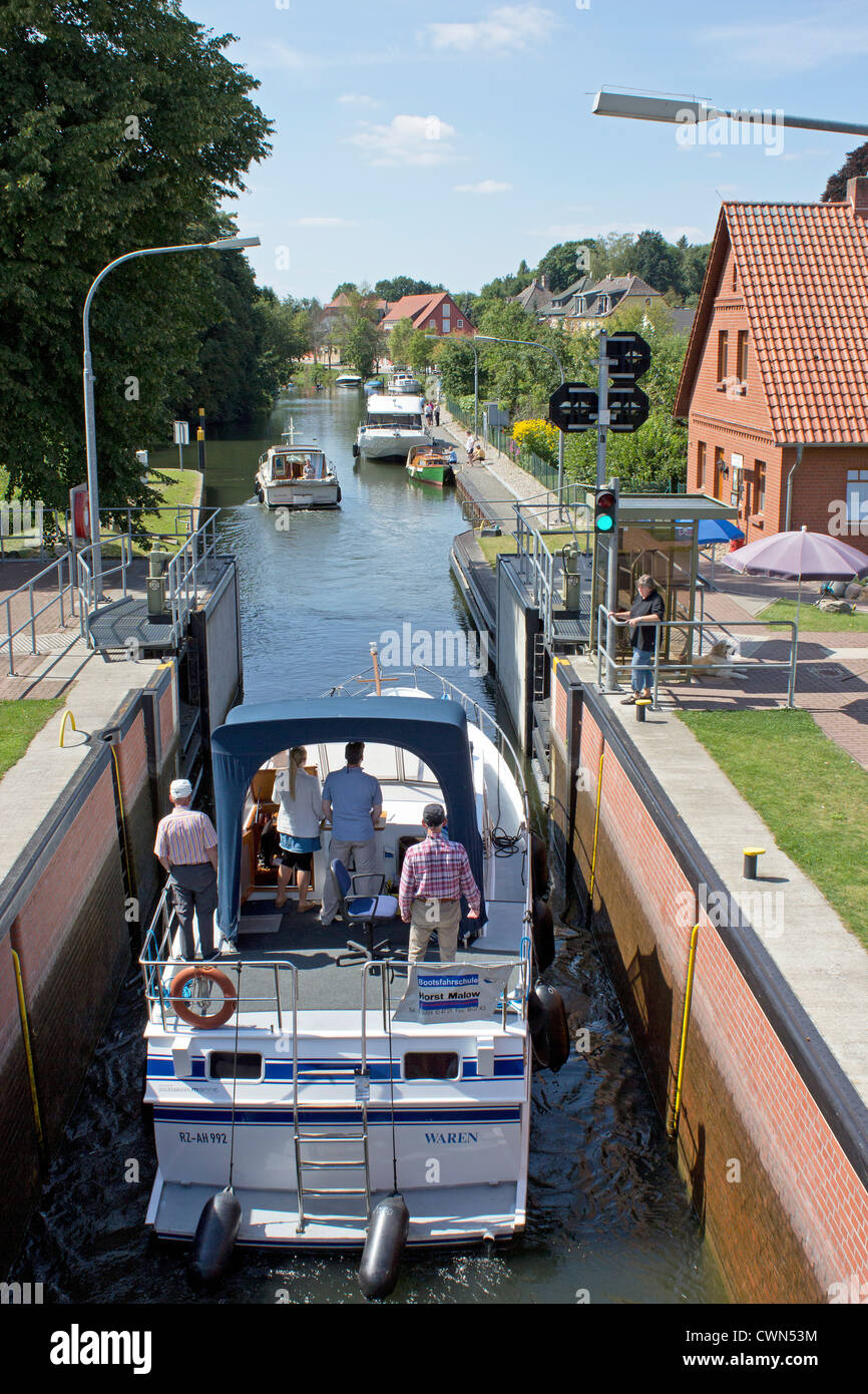 yacht inside the canal lock, Plau, Mecklenburg Lakes, Mecklenburg-West ...