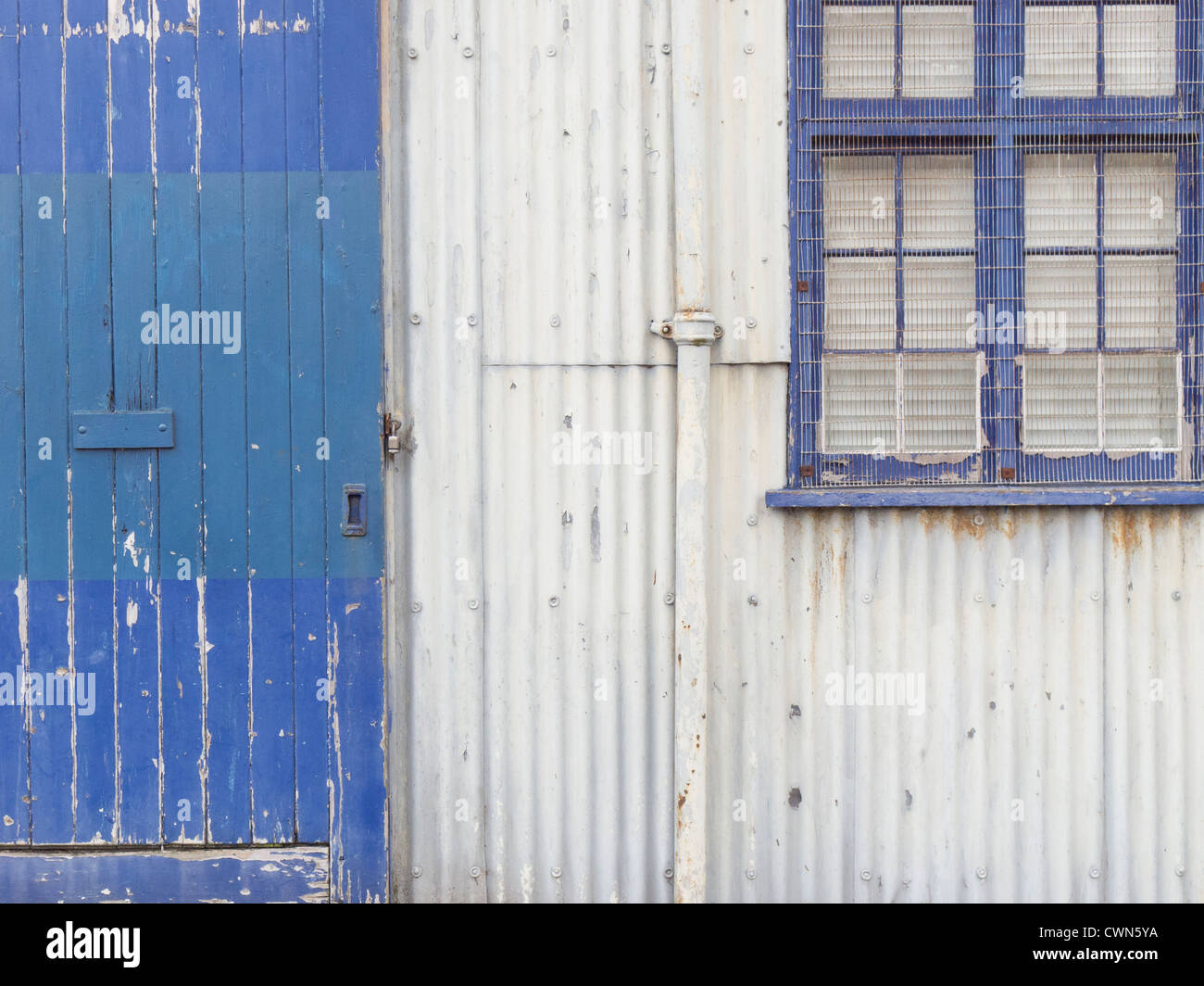 Blue shed exterior and door Stock Photo - Alamy
