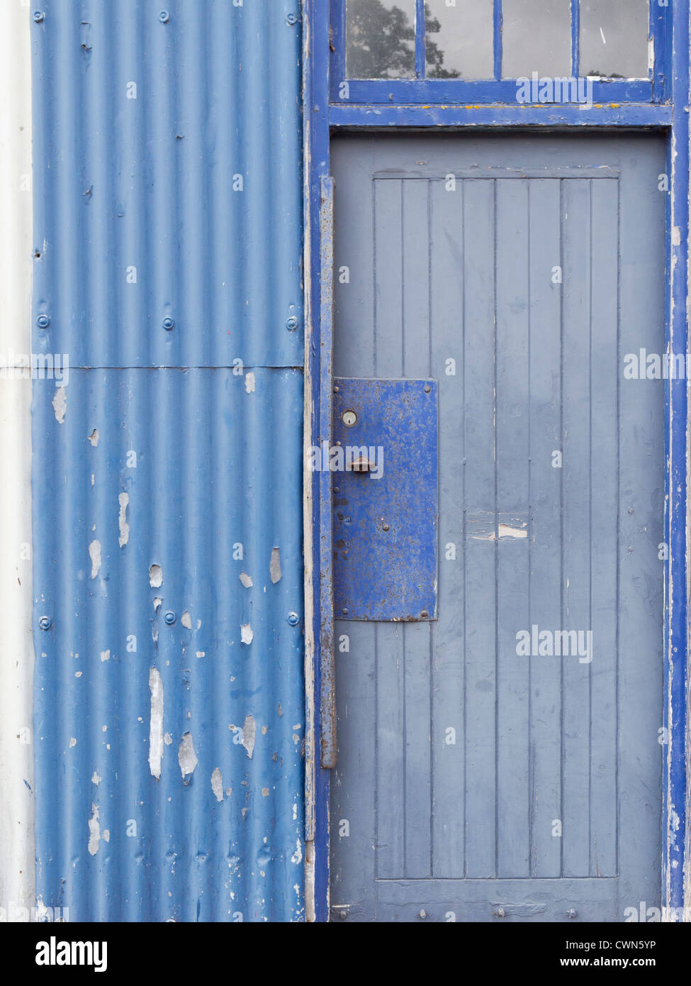 Blue shed exterior and door Stock Photo - Alamy